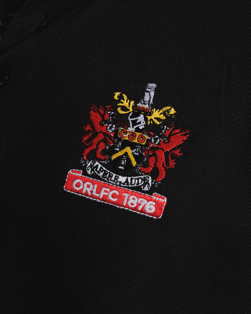 Oldham RLFC 2026 Vertex Polo Shirt Black/Amber
